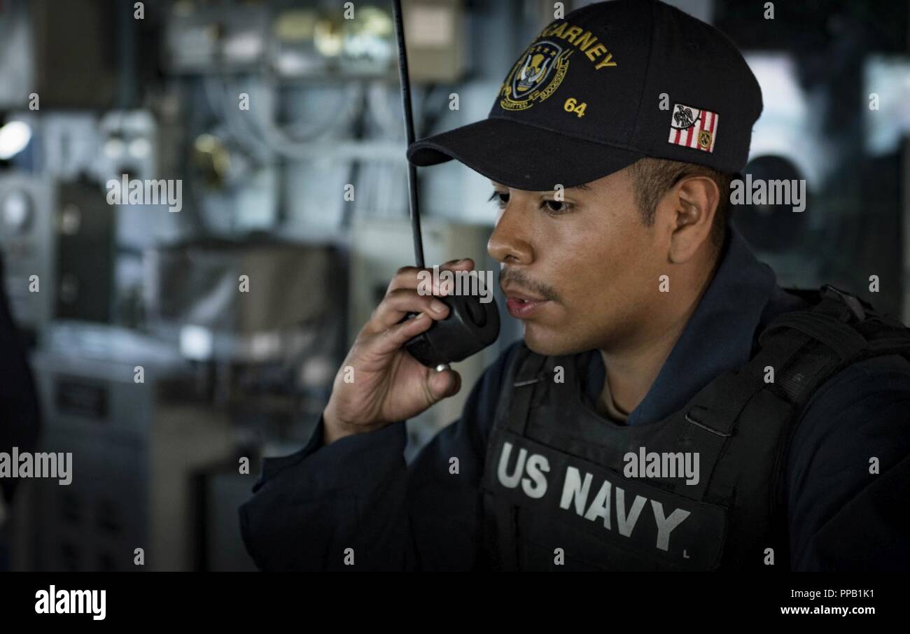 SEA (Aug. 13, 2018) Boatswains Mate Seaman Jose Escobar repeats orders ...