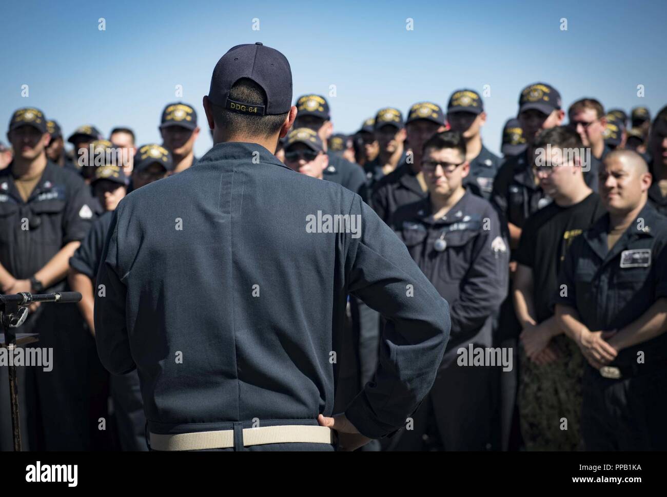 SEA (Aug. 13, 2018) Cmdr. Tyson Young, commanding officer of the ...