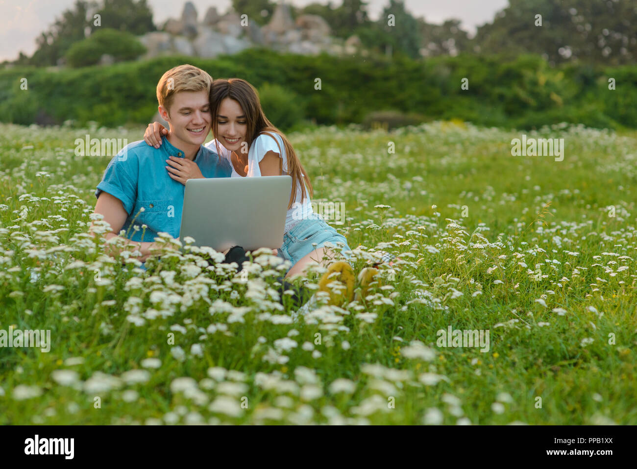 Warm embracements of sweet couple Stock Photo - Alamy