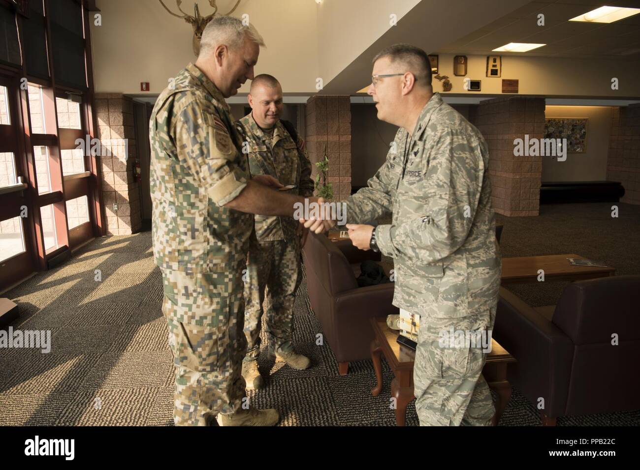 Col. Armands Saltups, Air Force commander, Latvian National Armed Forces, and Col. John Miner ...