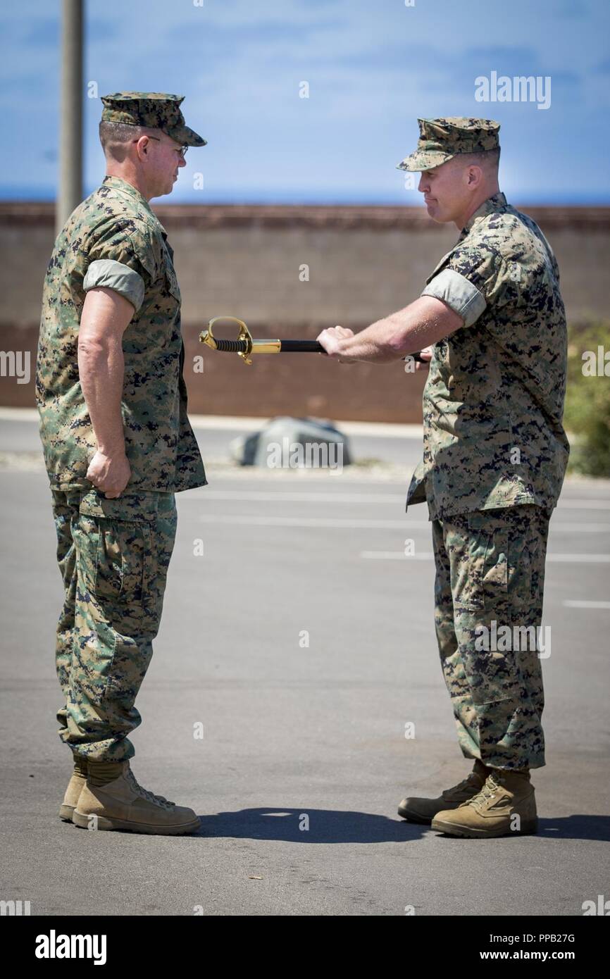 U.S. Marine Corps Sgt. Maj. Bryan L. Marzzarella, right, outgoing ...