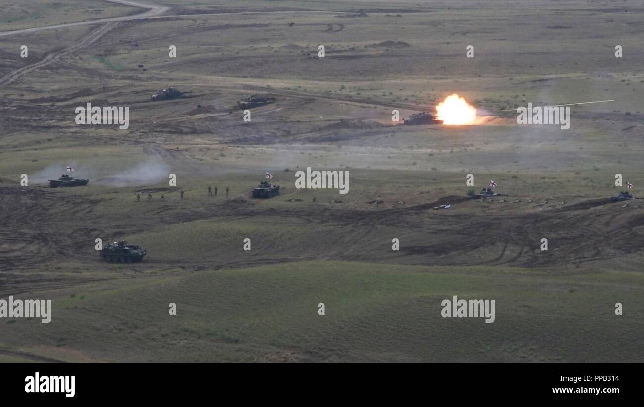 U.S. Soldiers assigned to 1st Calvary Division engage targets with a M1 ...