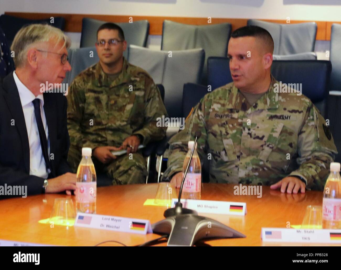 Maj. Gen. Steven A. Shapiro, 21st Theater Sustainment Command commanding general (right) briefs ...