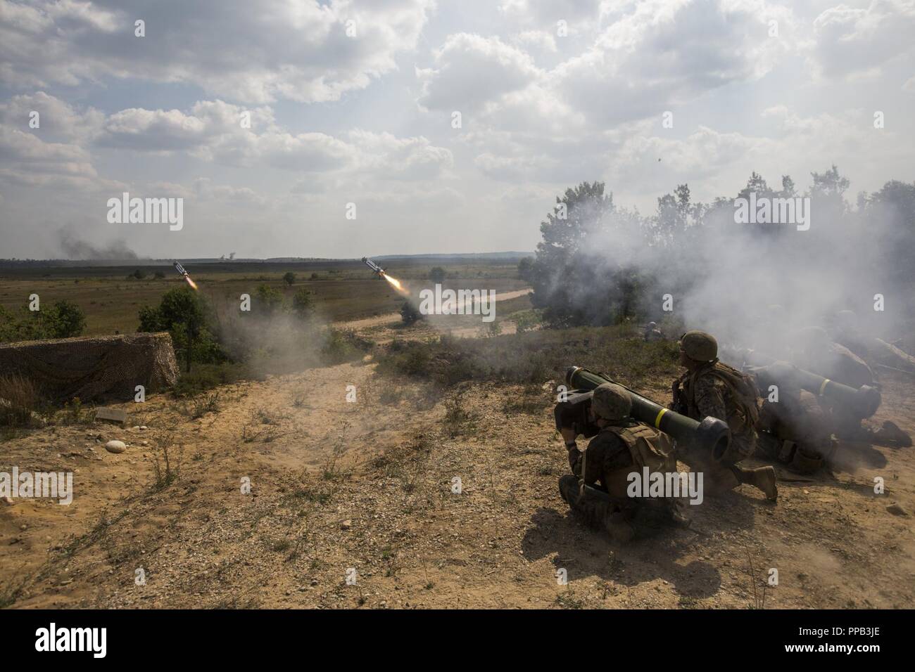 Marines with Weapons Company, 3rd Battalion, 25th Marine Regiment, fire ...