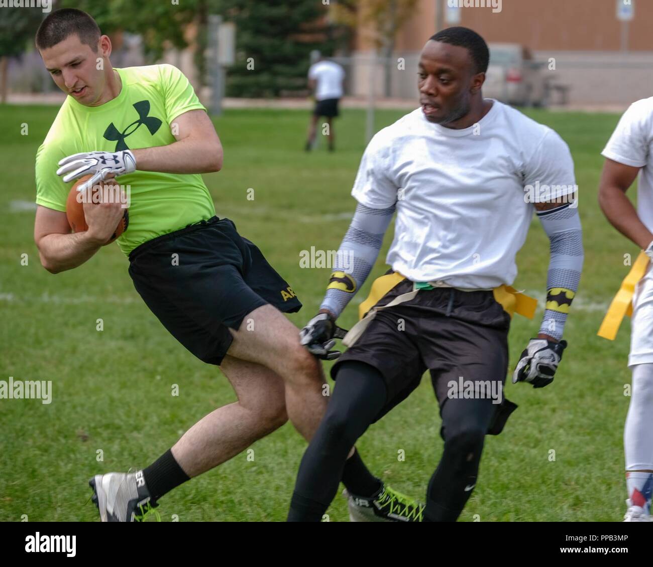 A Soldier catches a football during a round of flag football during Ivy ...