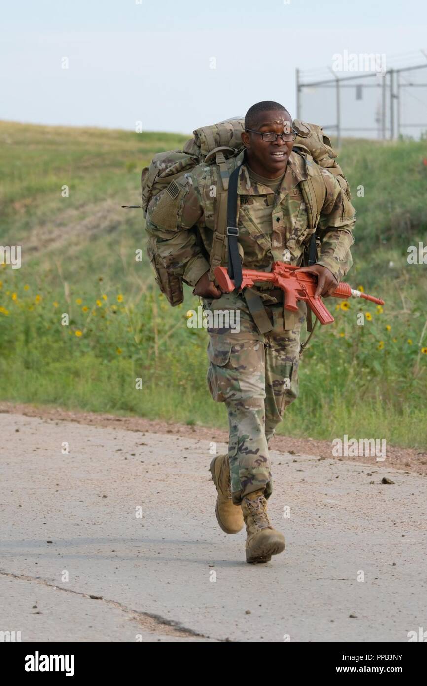 A Soldier nears the finish line at the squad ruck relay event during ...