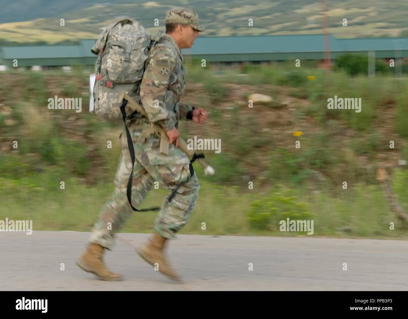 A Soldier executes the squad ruck relay event during Ivy Week 2018 at ...