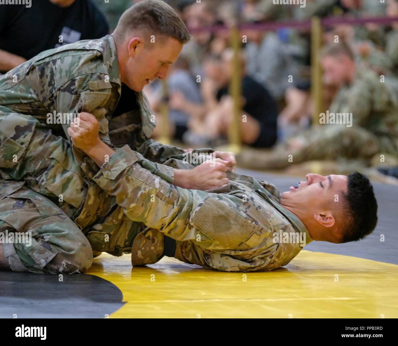 Two Soldiers compete in the combatives tournament during Ivy Week 2018 ...