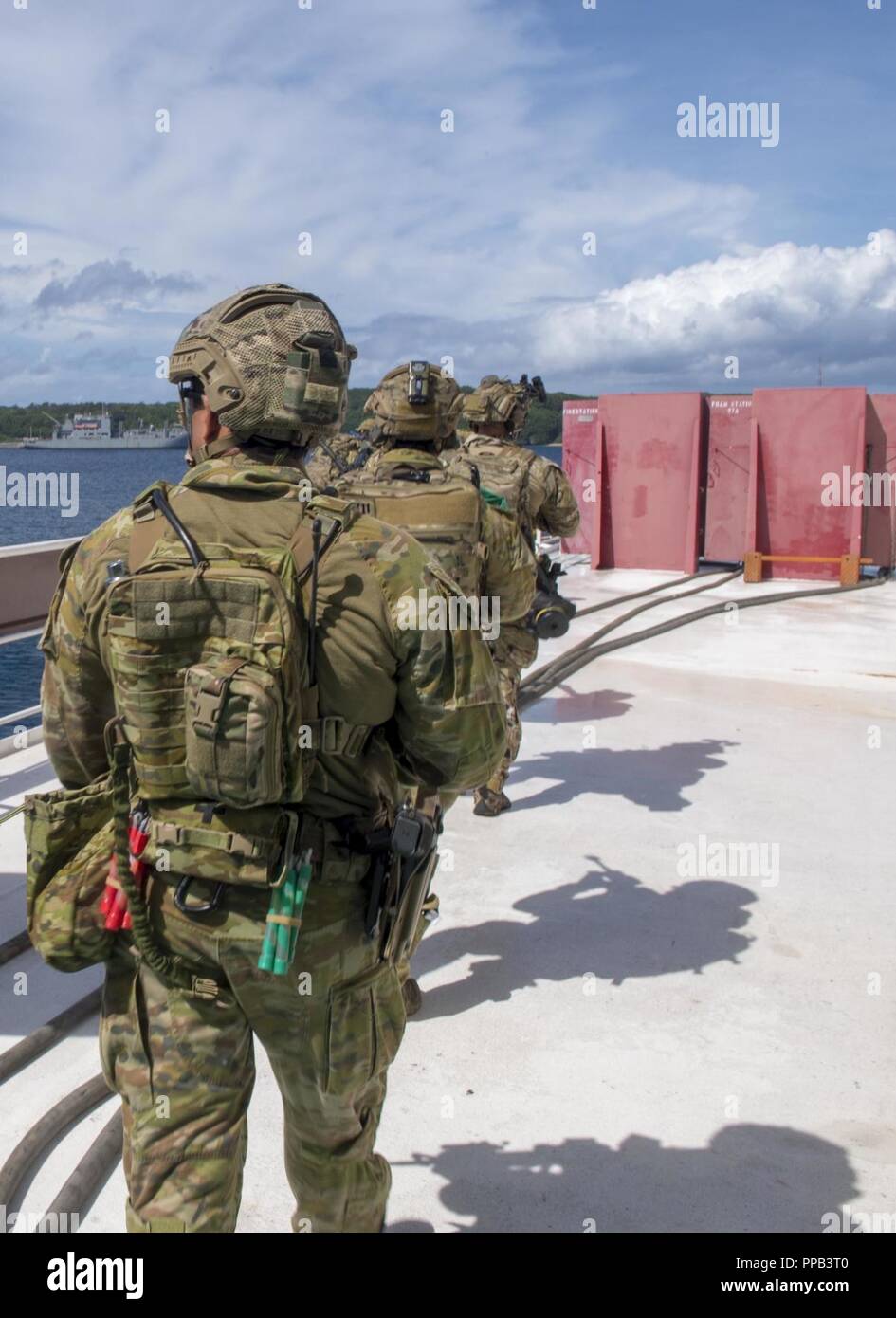 Sailors attached to Explosive Ordnance Disposal Mobile Unit (EODMU) 5 ...