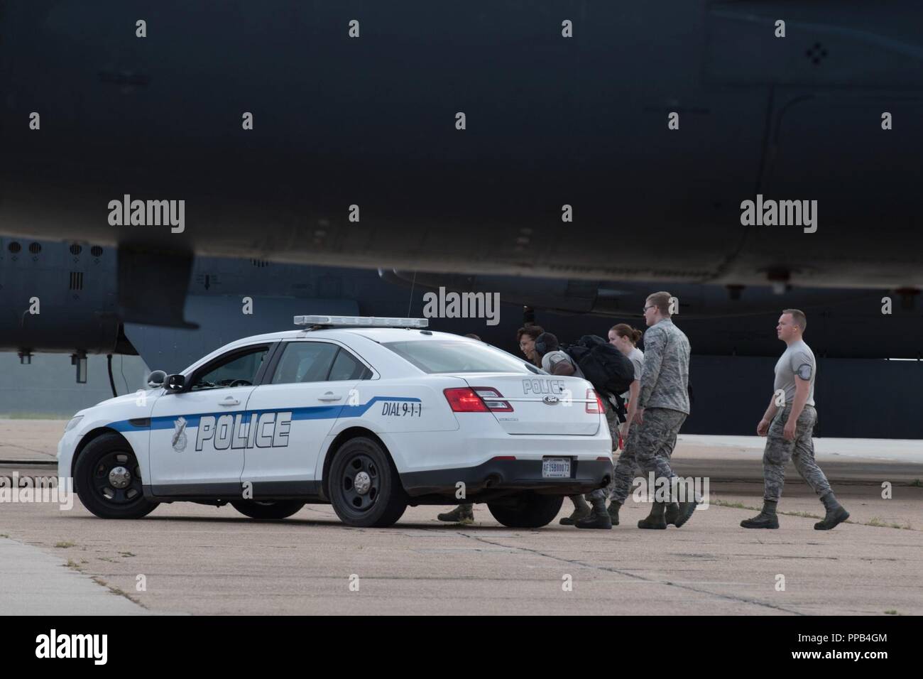 Second Security Forces Squadron personnel escort Airmen to safety ...