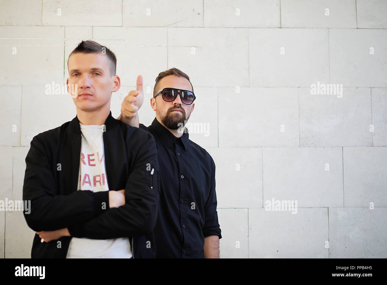 Two men in sunglasses Stock Photo - Alamy