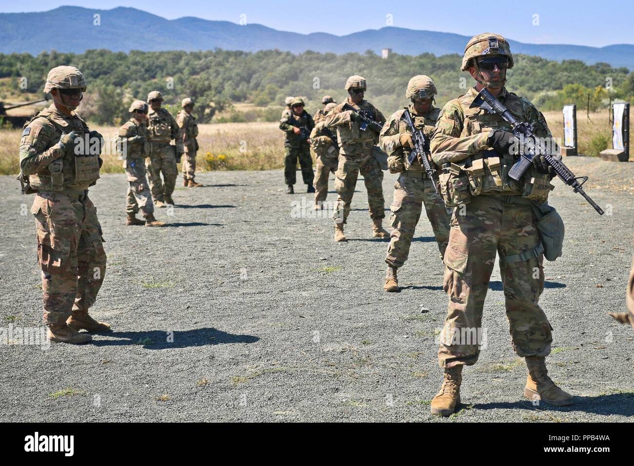 U.S. Soldiers from Alpha Company, 2nd Battalion, 5th Cavalry Regiment ...