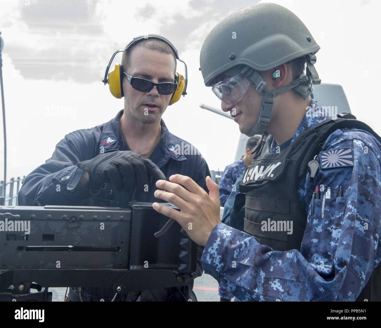 SEA OF JAPAN (August 15, 2018) Gunner’s Mate 2nd Class Matthew Spano ...
