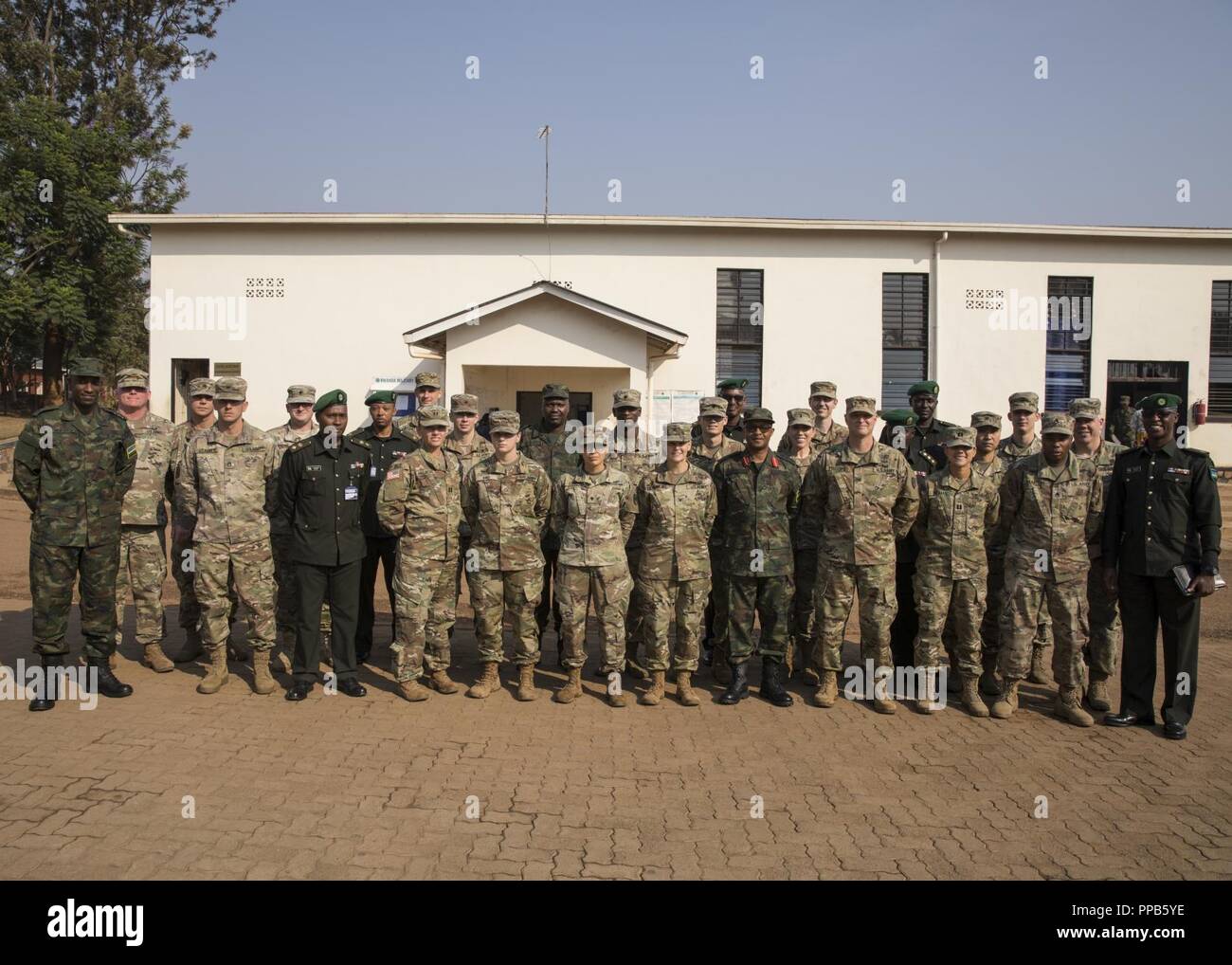 U.S and Rwandan medical personnel pose for a group photograph during ...