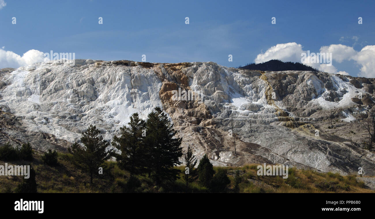 MAMMOTH HOT SPRINGS. Travertine marble mountain and geothermal complex ...