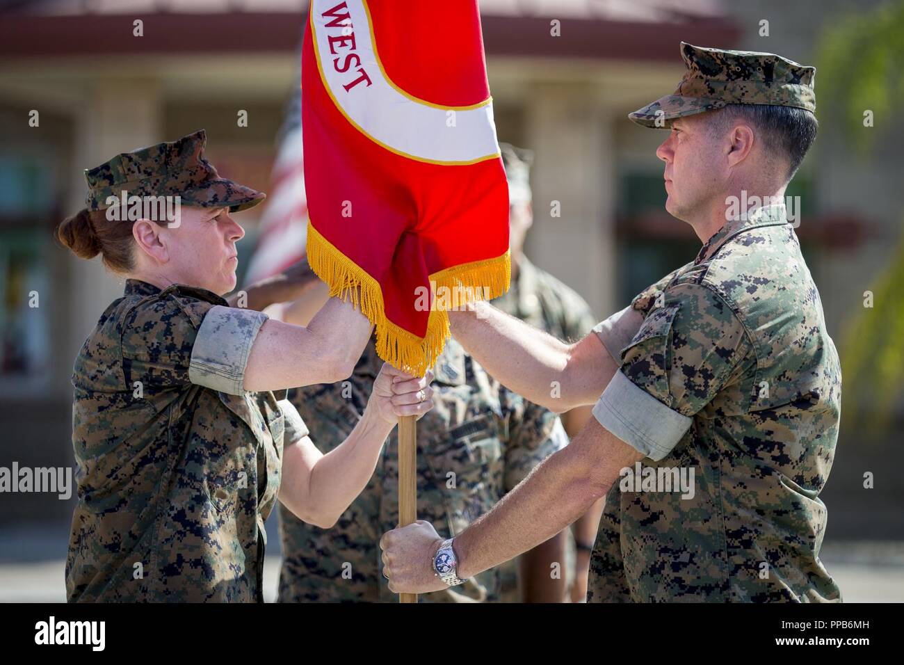U.S. Marine Corps Lt. Col. Stephen H. Mount, right, outgoing commanding ...