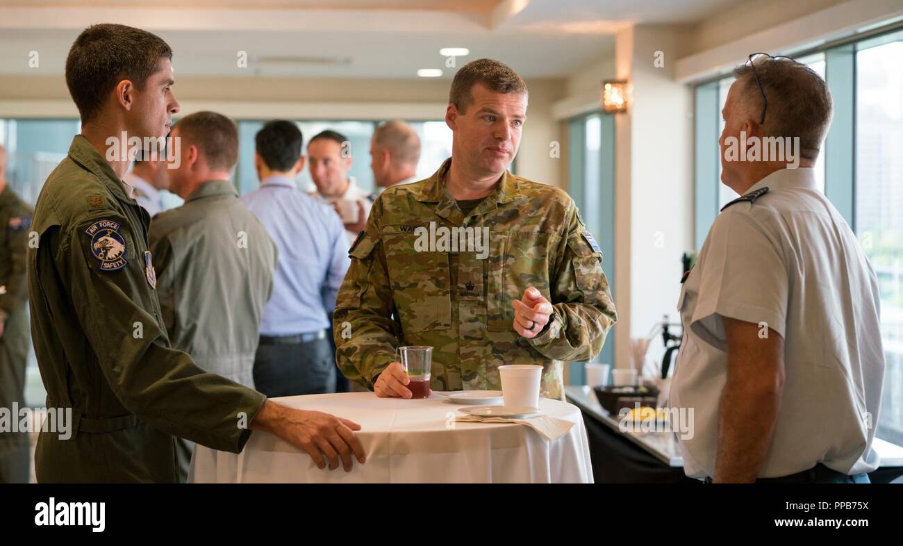 U.S. Air Force Maj. Eric Johnston (left), Royal Australian air force ...