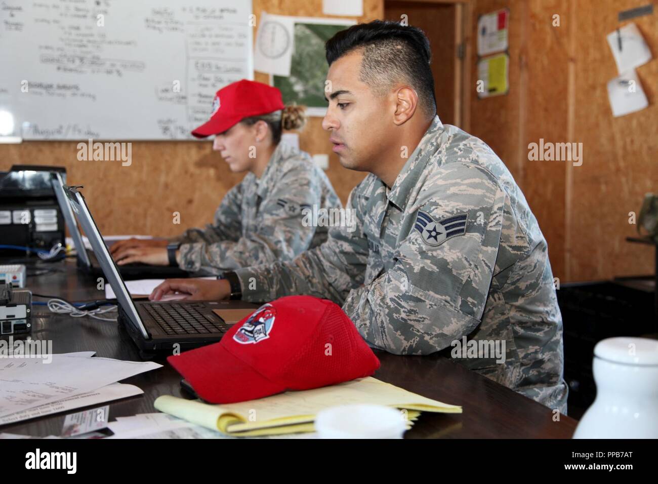 Senior Airman Allen Aguilar and Airman 1st Class Miranda Burley input ...
