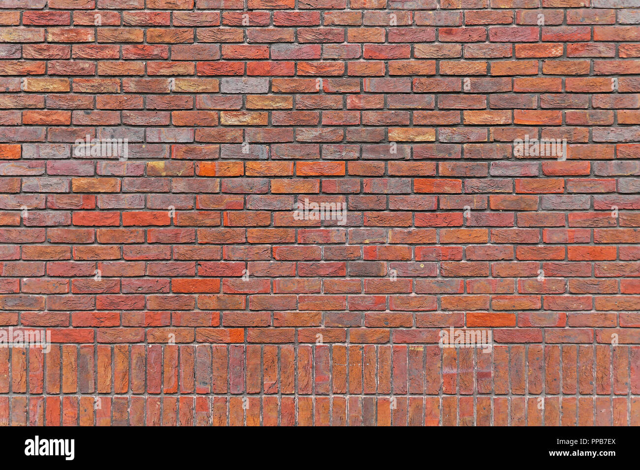 Red wall with old style bricks Stock Photo - Alamy