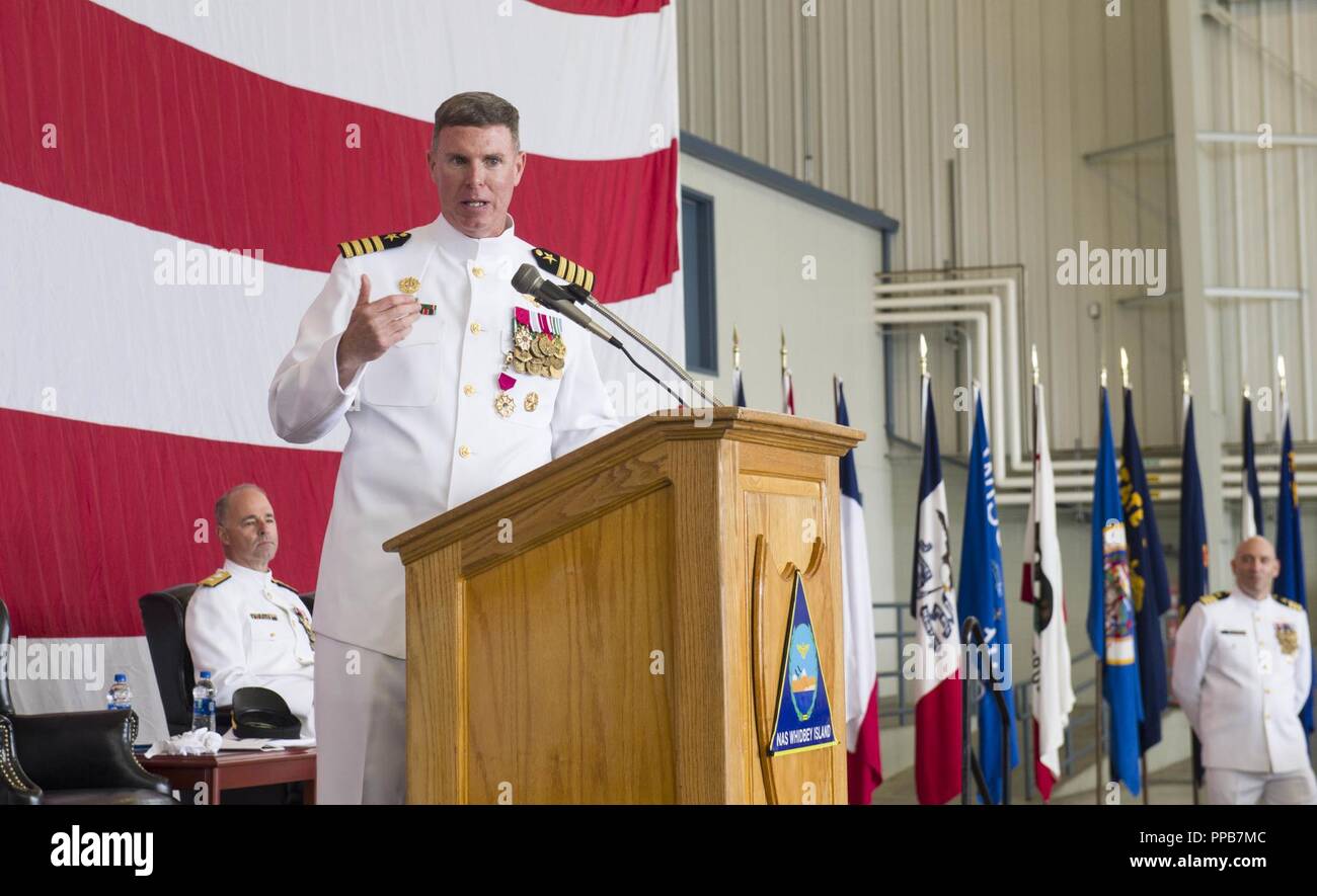 OAK HARBOR, Wash. (Aug. 17, 2018) Capt. Geoffrey Moore, outgoing ...