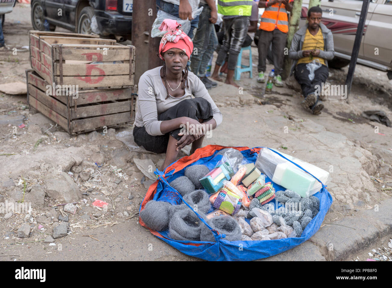 Woman selling cleaning materials, Addis Ketema aka Merkato, the largest ...