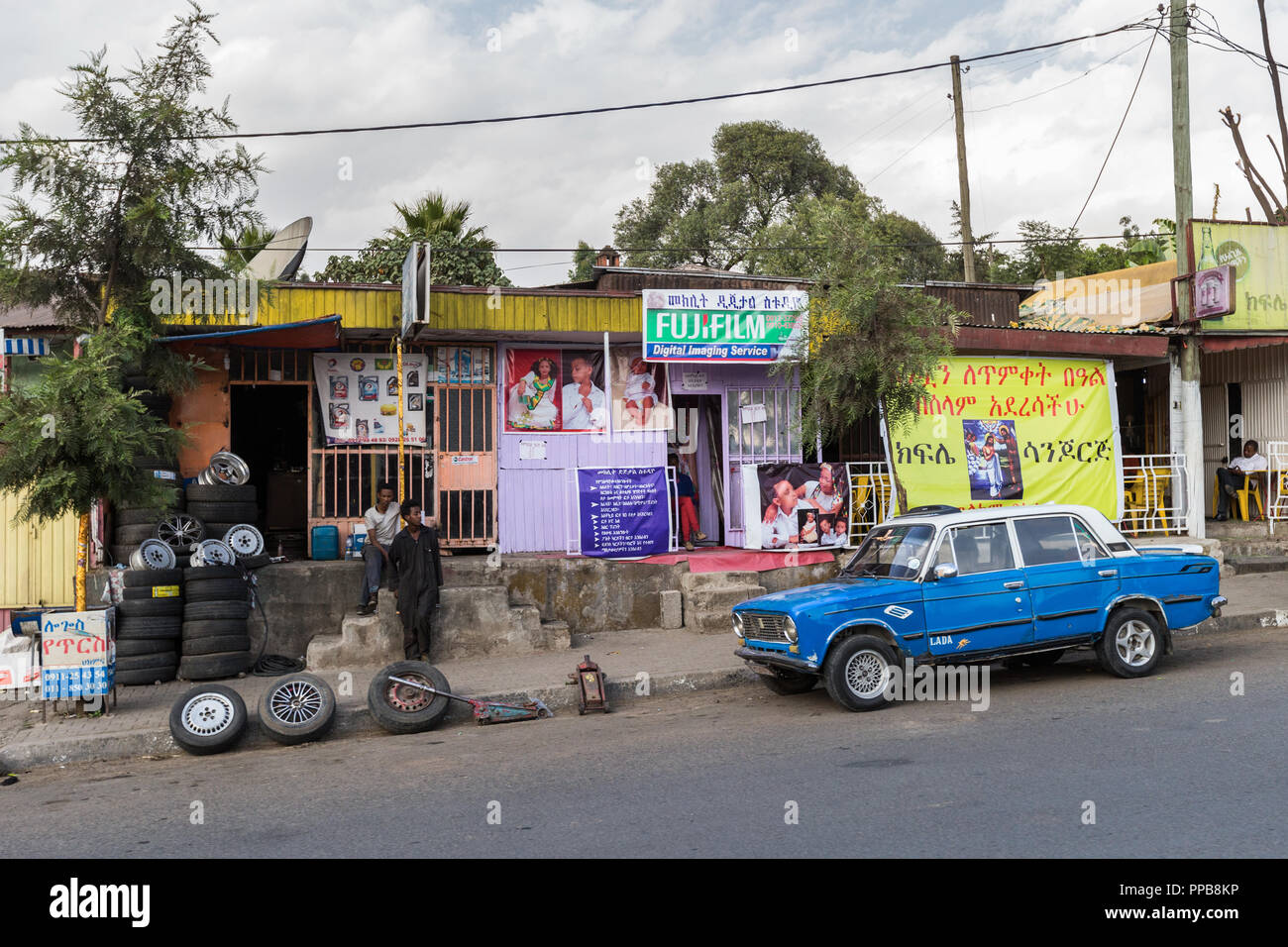Addis Ababa, Ethiopia, Africa. Taxi in front of tyre and photography ...
