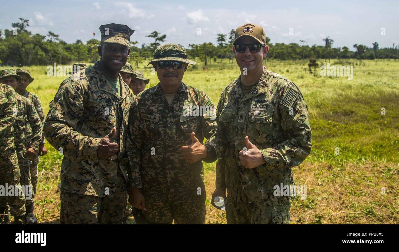 TANDUO BEACH, Malaysia – U.S. Marine Sgt. Maj. Brian Priester (left ...