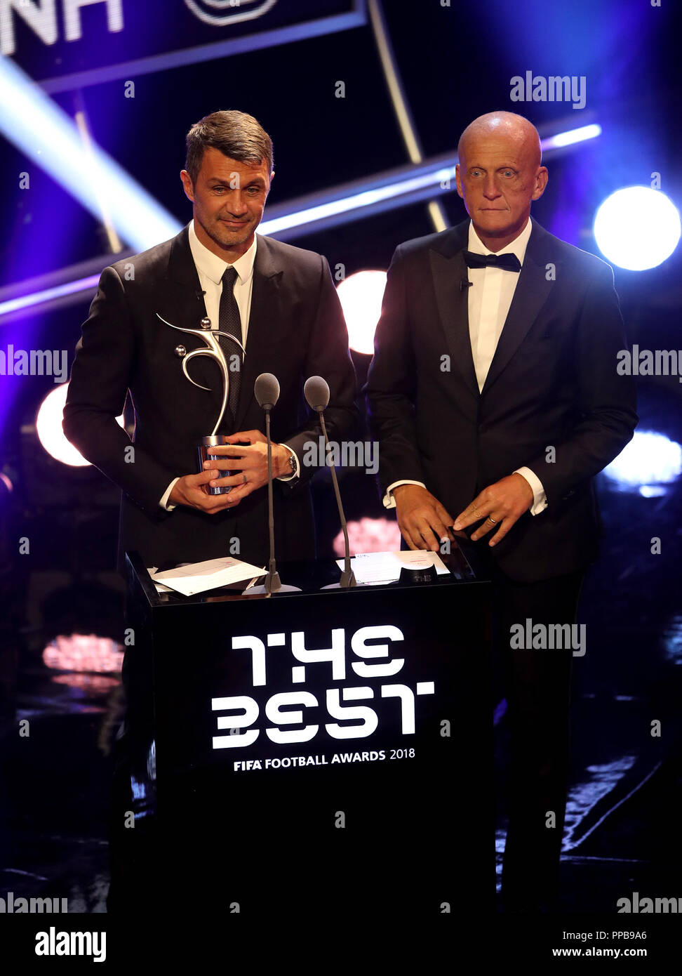 Paolo Maldini (left) and Pierluigi Collina (right) on stage presenting ...