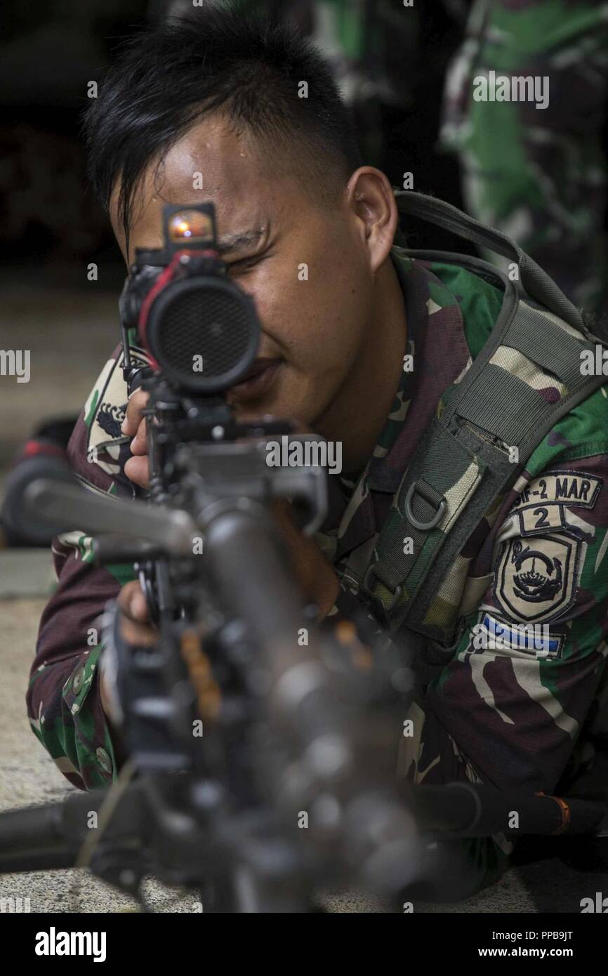 PACIFIC OCEAN (Aug. 13, 2018) - An Indonesian Marine sights in on an ...