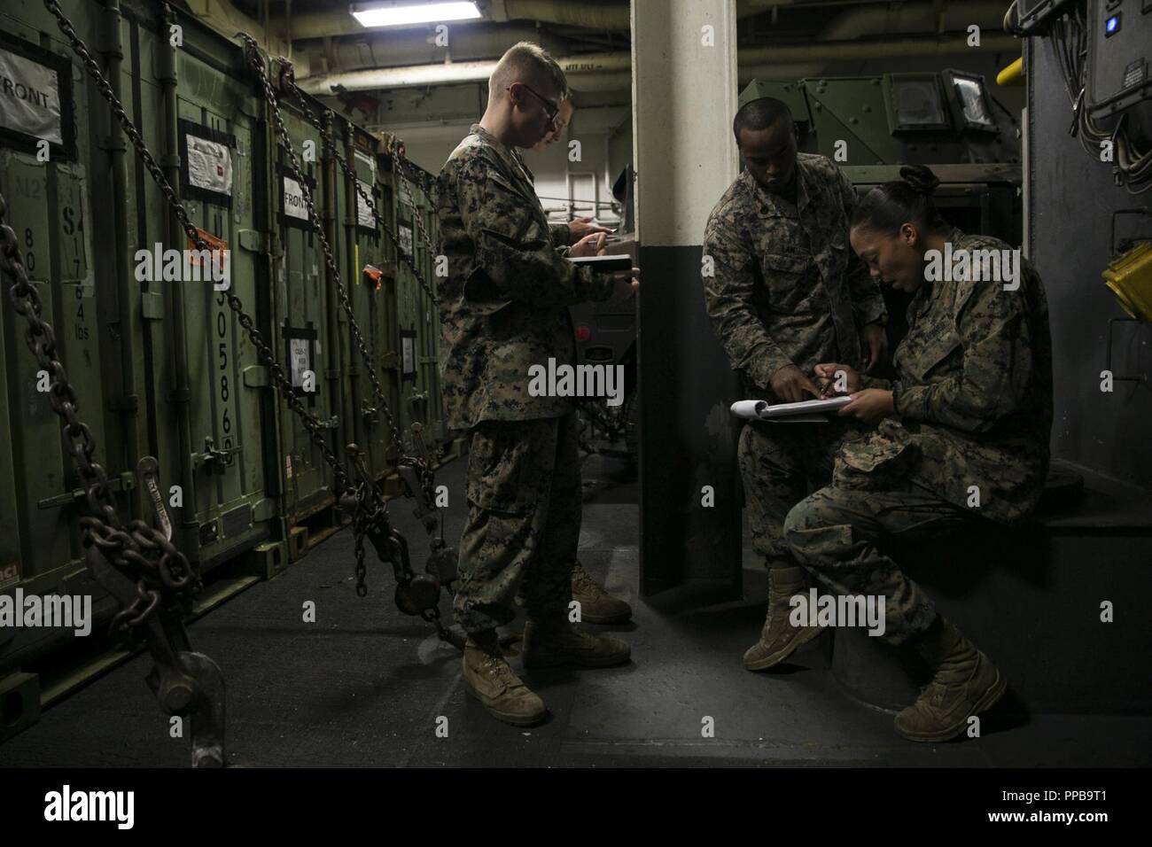 Marines with the 31st Marine Expeditionary Unit verify gear serial ...