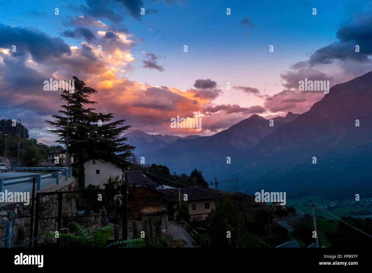 Sunset on italian Alps Mountain. Colorfull sky Stock Photo - Alamy