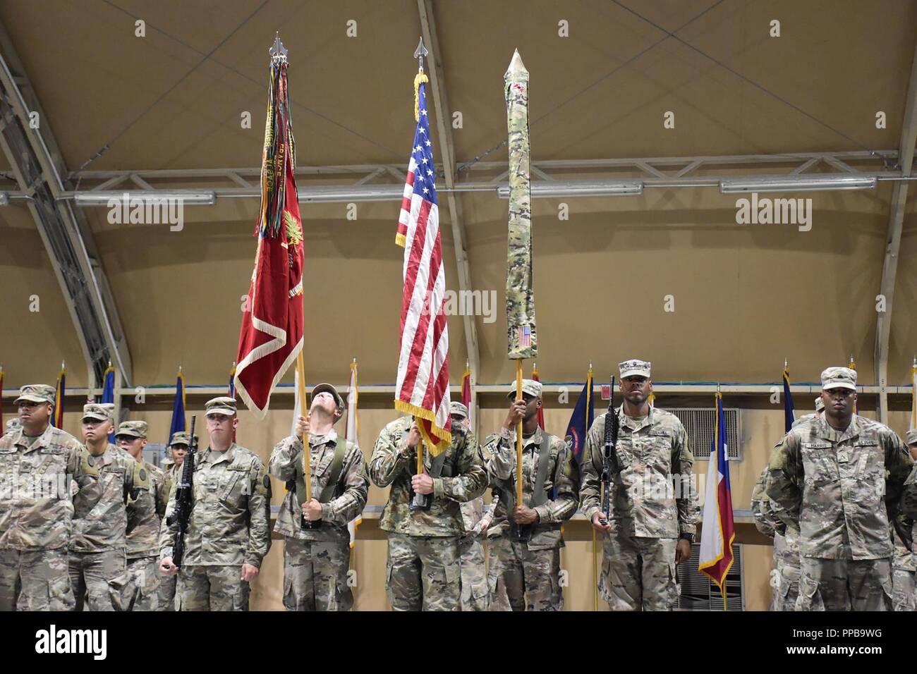 CAMP ARIFJAN, KUWAIT – The posting of the U.S. flag and unit colors ...
