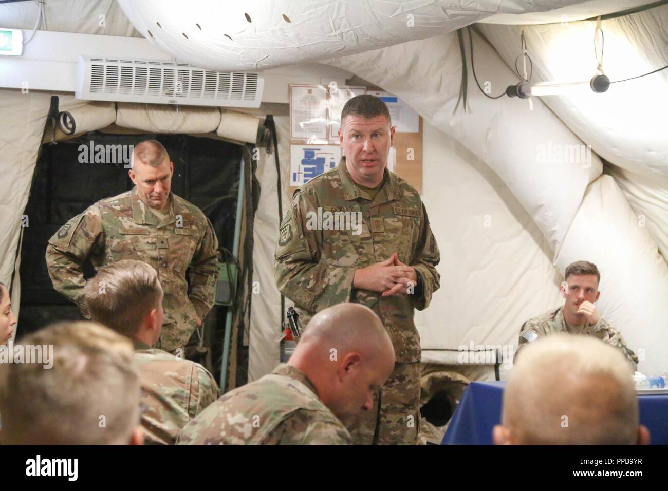 U.S. Air Force Command Chief Master Sgt. Chad Bickley speaks to Airmen ...