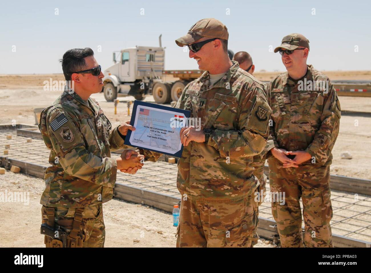 U.S. Air Force Col. Ray Zuniga (left), commander of 447th Air ...