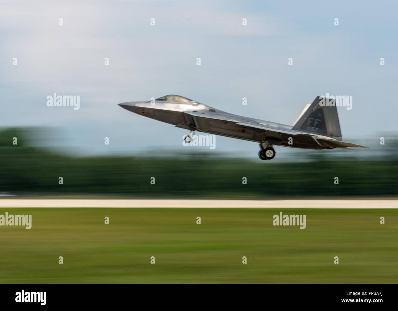 An F-22 Raptor lands at Volk Field Air National Guard Base, Wisconsin ...