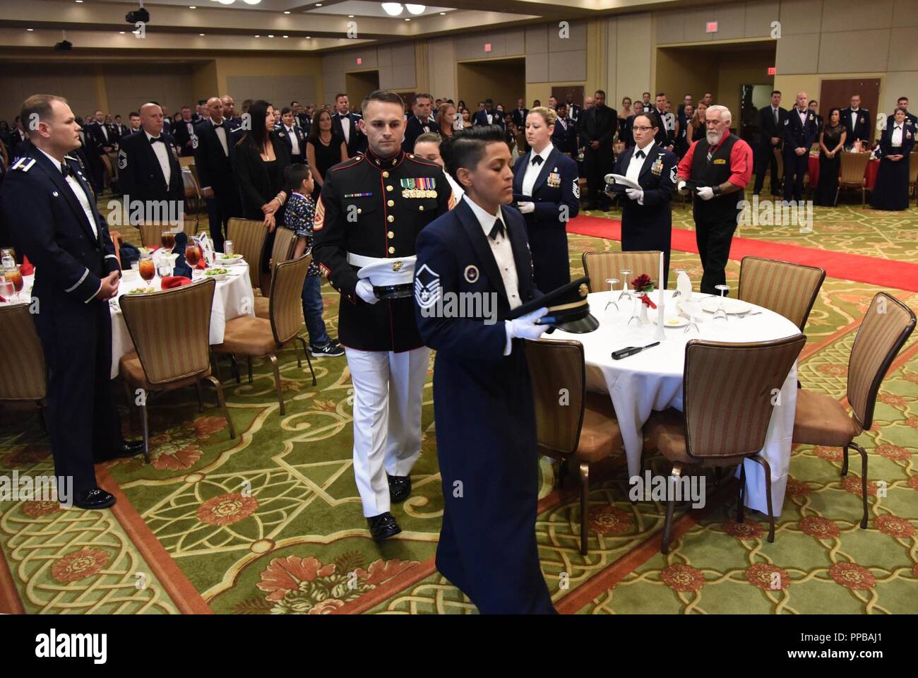 Military and civilian service members participate in a POW/MIA table ...