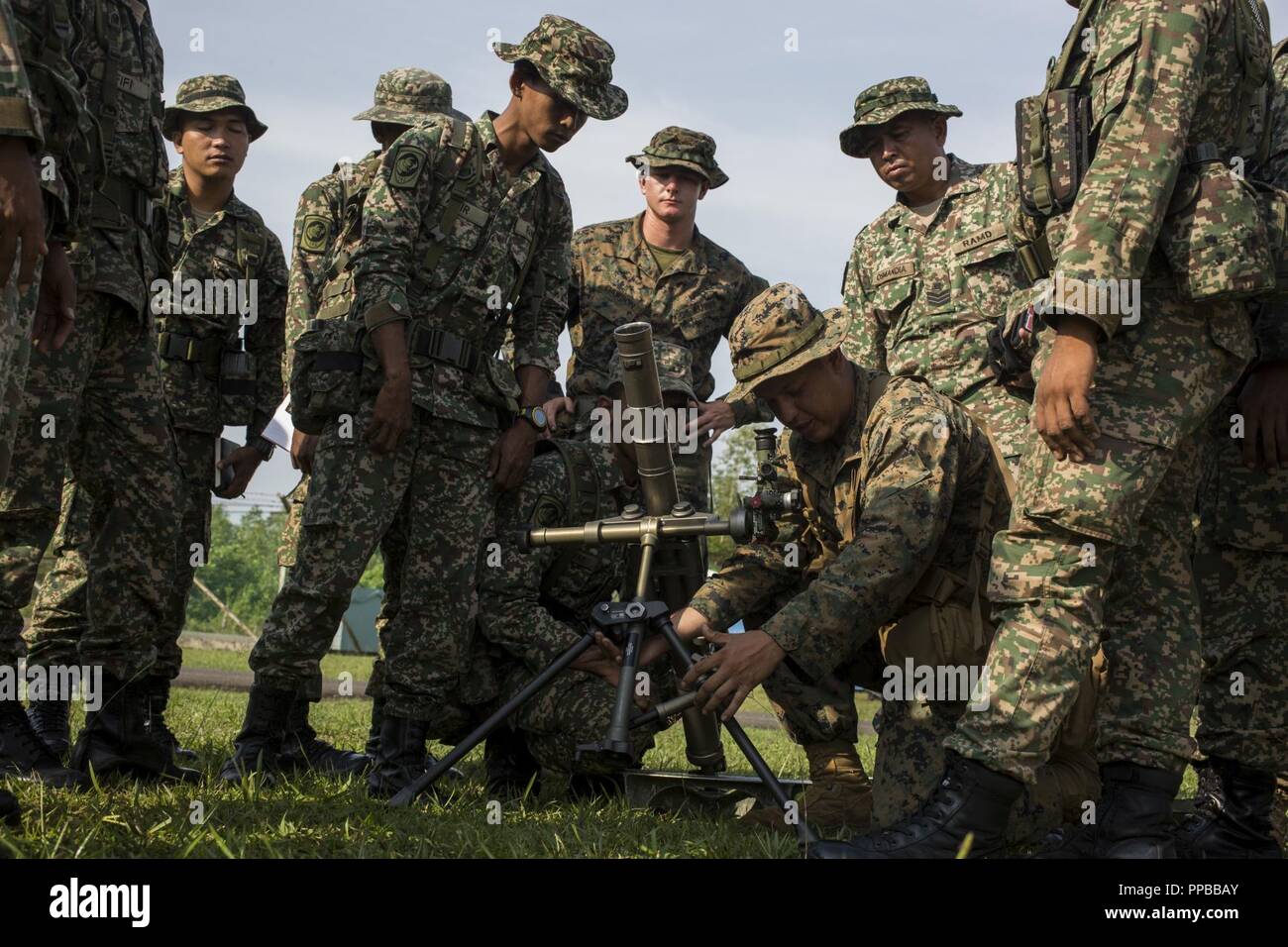U.S. Marines attached to Fox Company, 2nd Battalion, 3rd Marines, teach ...