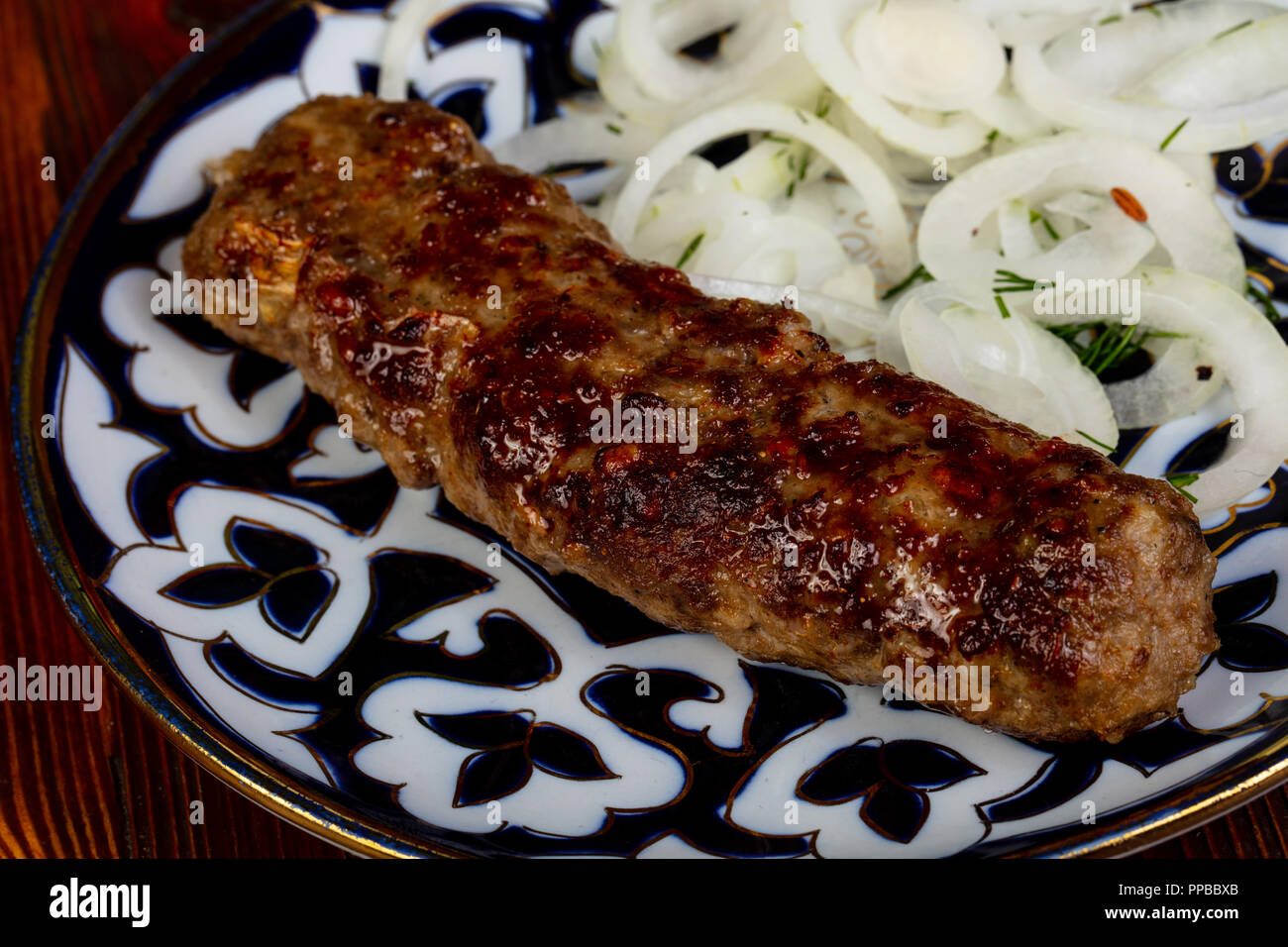 Minced Beef kebab with onion Stock Photo - Alamy