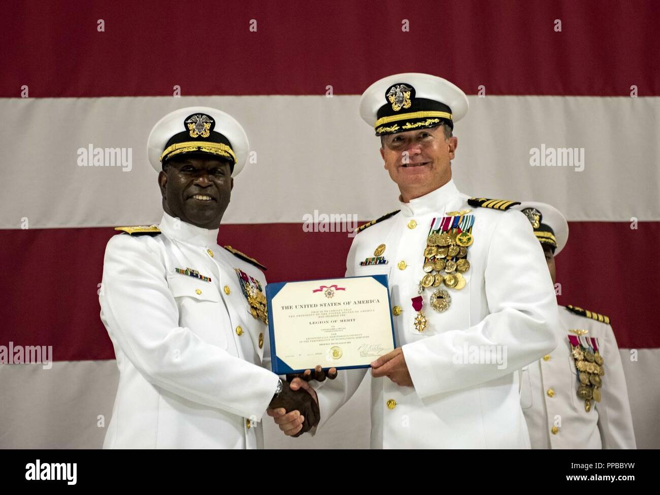 VIRGINIA BEACH, Va. (Aug. 16, 2018) Rear Adm. Stephen Evans awards the ...