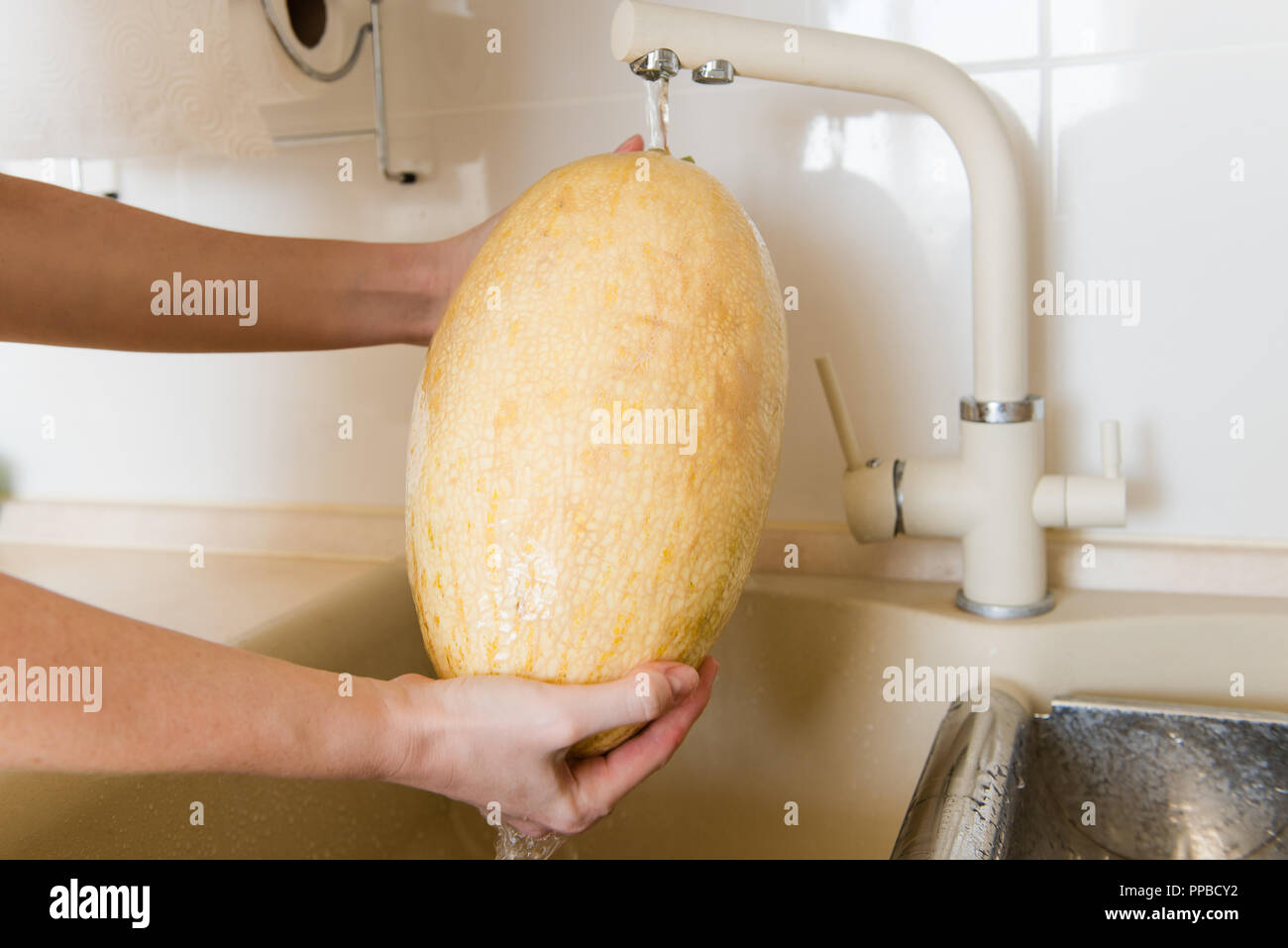 Washing melon hi-res stock photography and images - Alamy