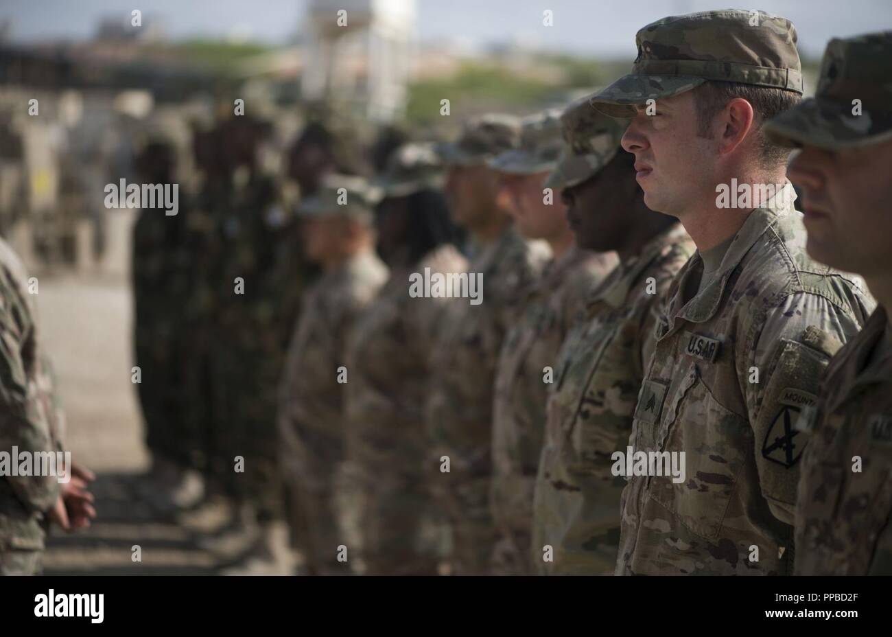 U.S. Soldiers stand in formation during a logistics course graduation ...