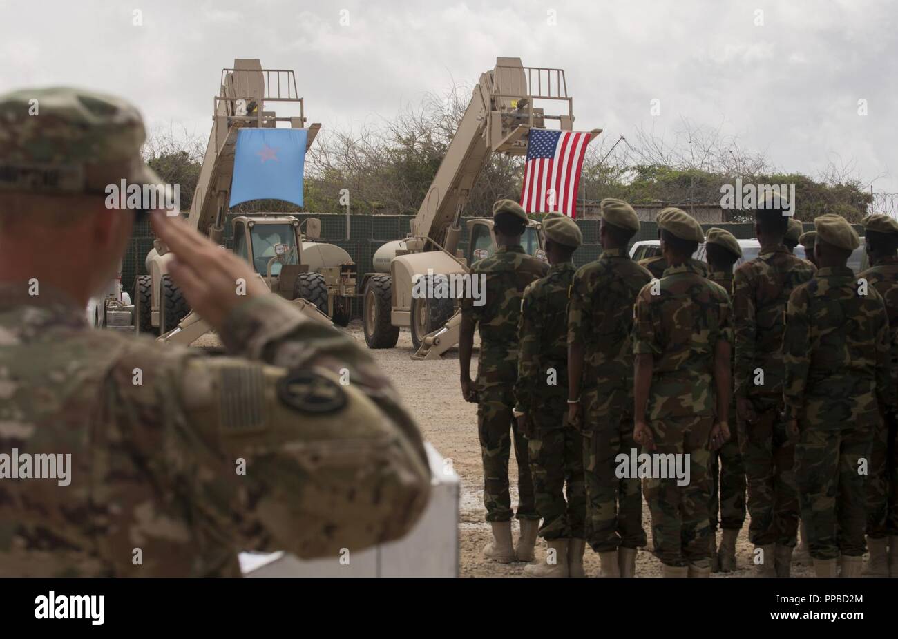 Somali national army soldiers stand in formation during a logistics ...