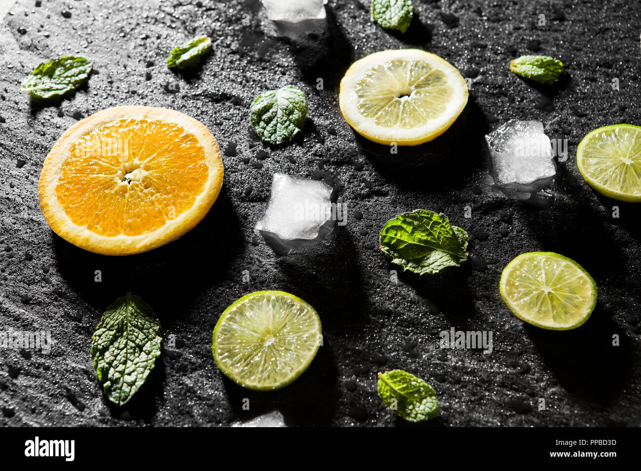 Lime background. Limes with leaves and ice. On the stone table. Free ...