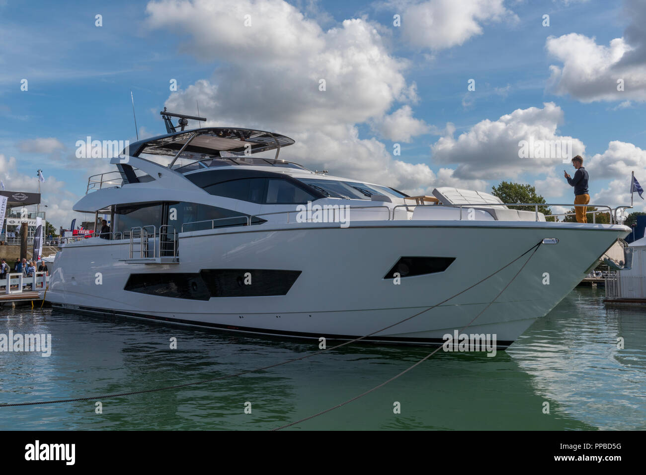 a large new motorboat or motor yacht on sale and display at the ...