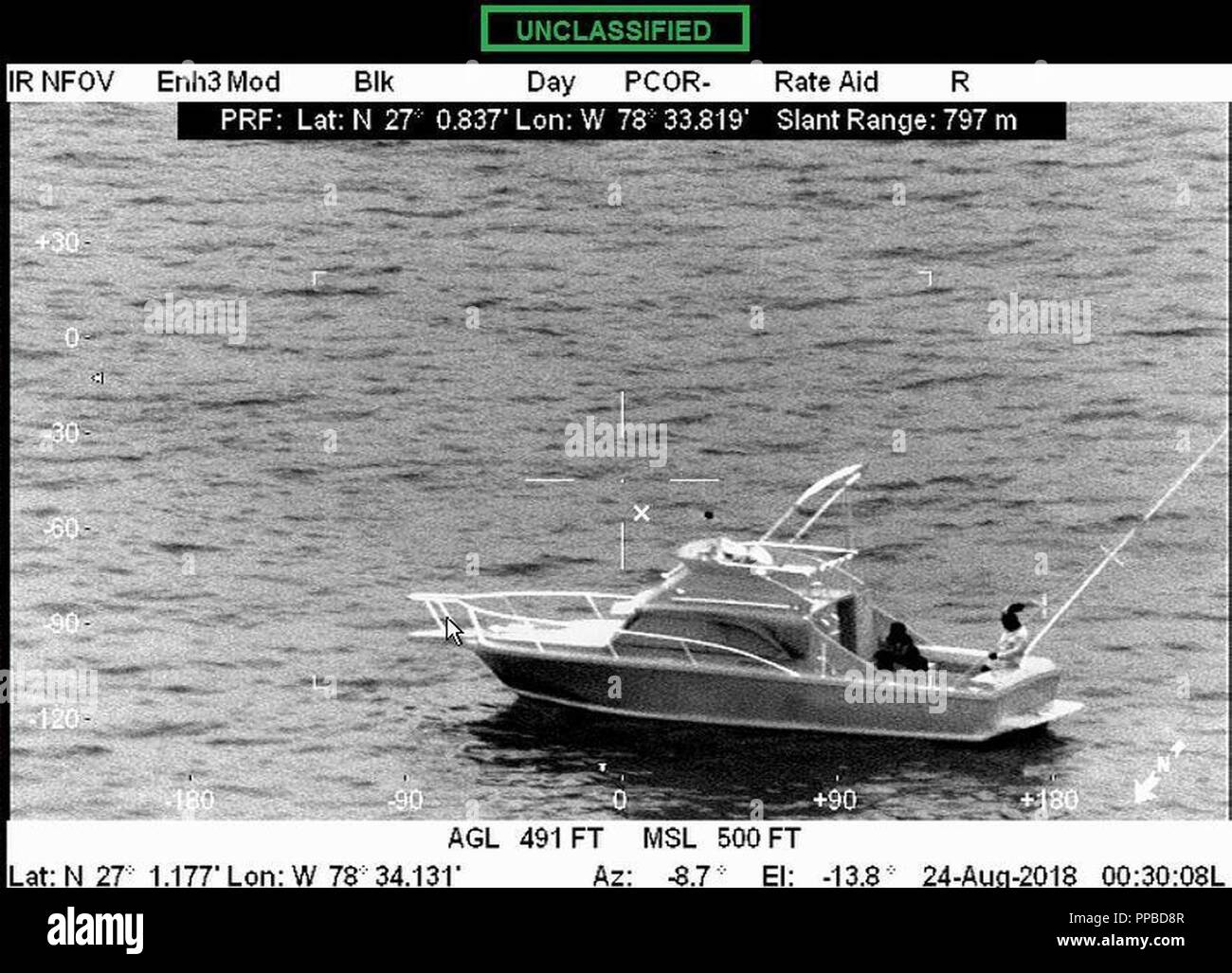 Two people in a 29-foot yacht are anchored Aug. 23, 2018 approximately ...