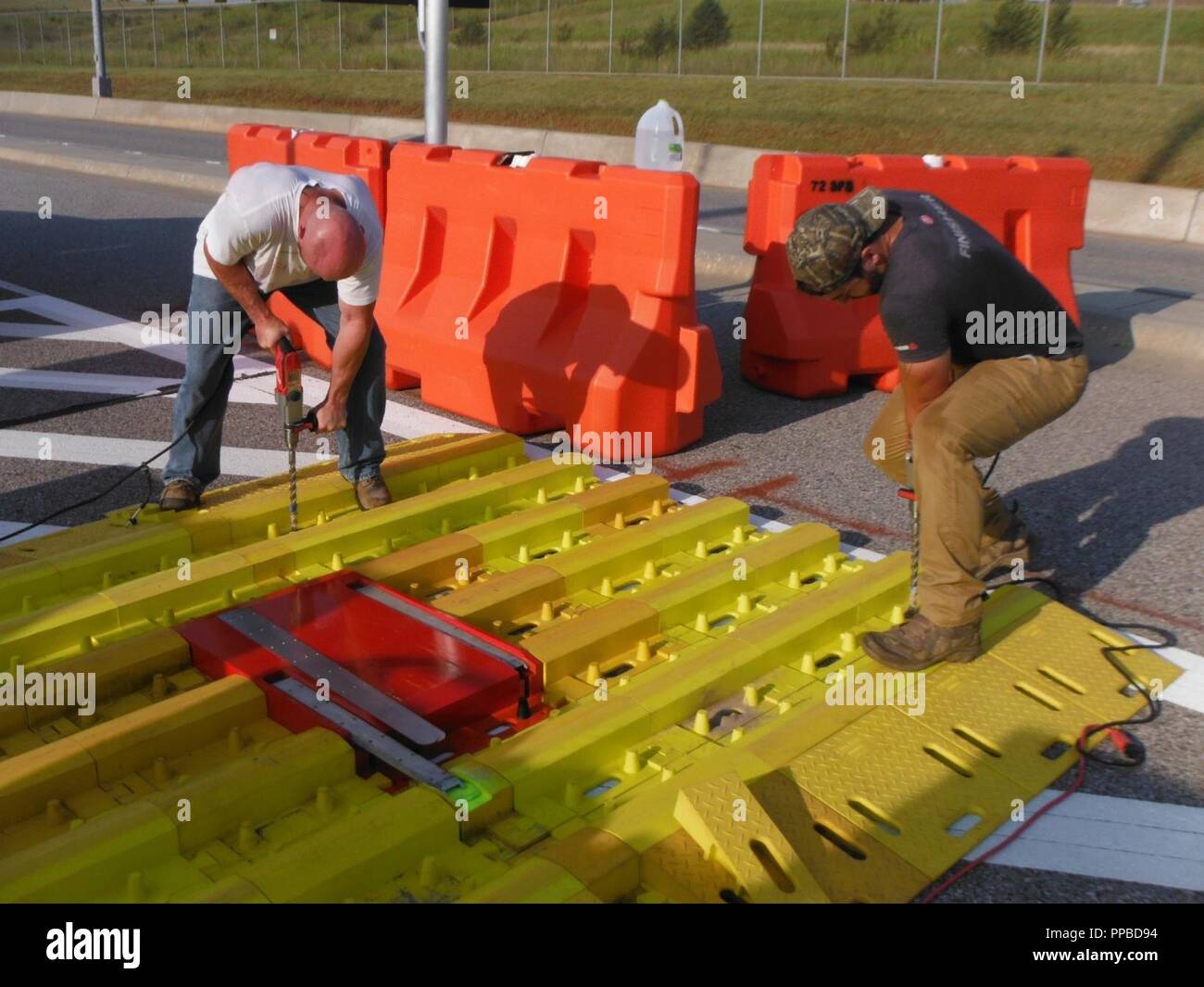 Pre emplaced electric vehicle stopper hi-res stock photography and ...