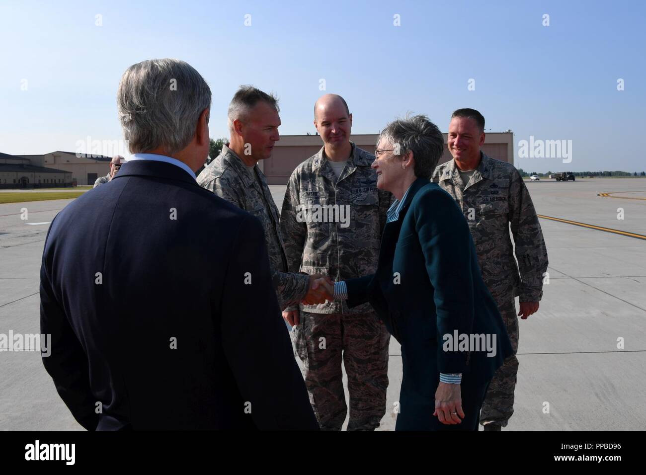 Secretary of the Air Force Heather Wilson is greeted by 319th Air Base ...