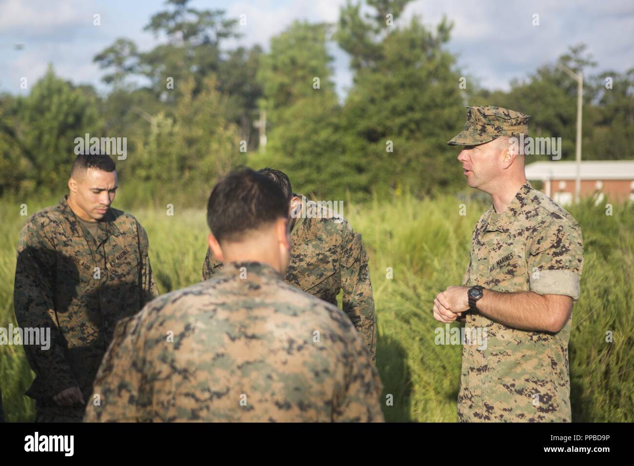U.S. Marine Corps Maj. Brady Bustin, a psychological operations officer ...