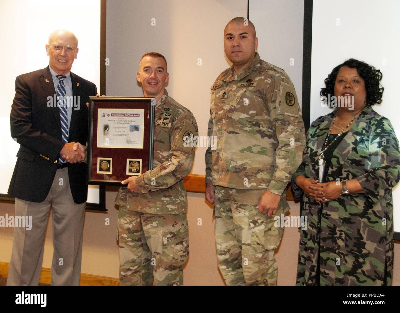 Mr. Gregg Stevens (left), Deputy to the Commanding General, U.S. Army ...