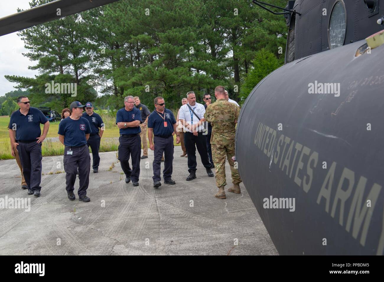 U.S. Army Staff Sgt. Mason, MH-47 crew chief, briefs Arnold Air Force ...